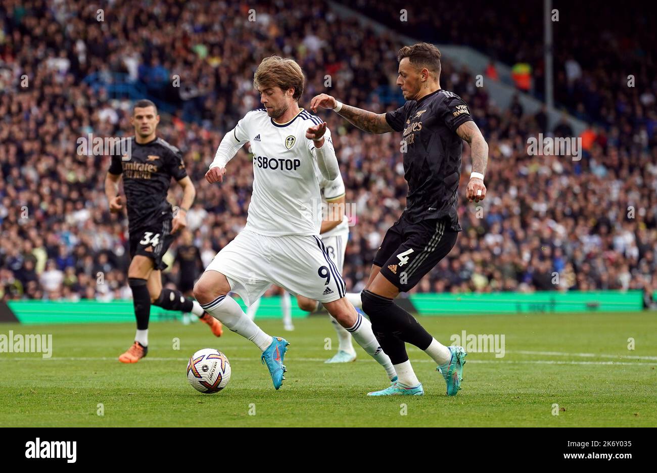 Arsenal's Ben White tackles Leeds United's Patrick Bamford during the ...