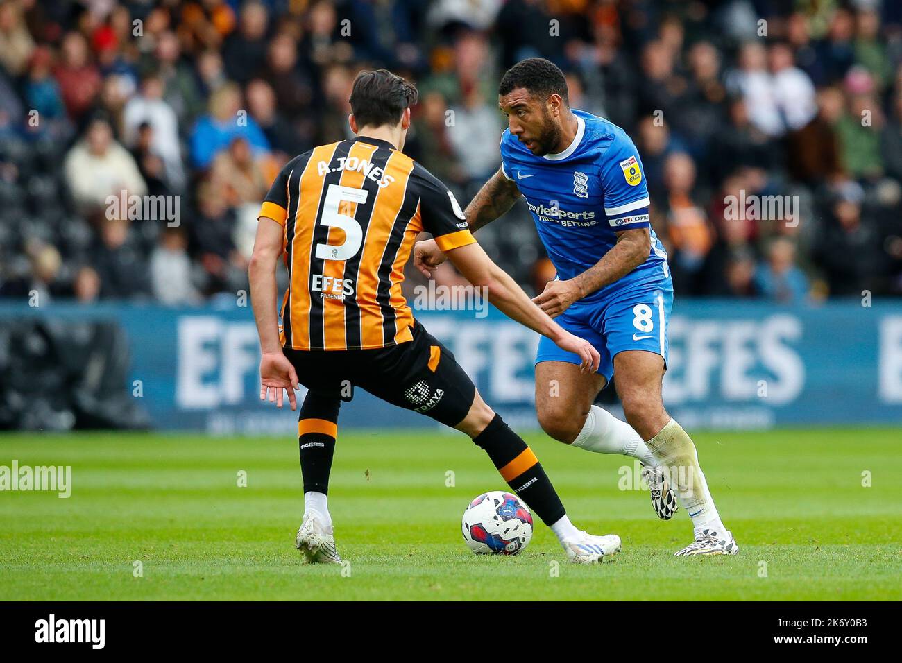 Alfie Jones #5 of Hull City and Troy Deeney #8 of Birmingham City ...