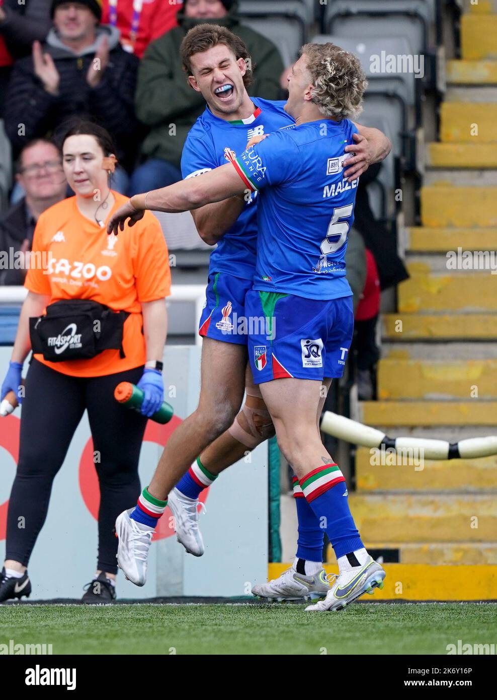 Italy’s Jake Maizen (right) celebrates scoring a try during the Rugby ...
