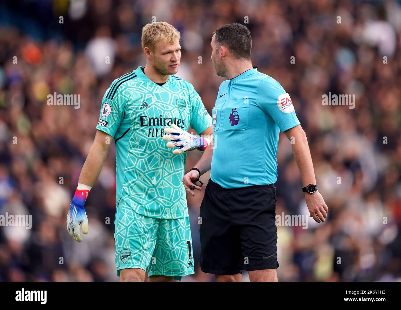 Arsenal goalkeeper Aaron Ramsdale and referee Chris Kavanagh during the ...
