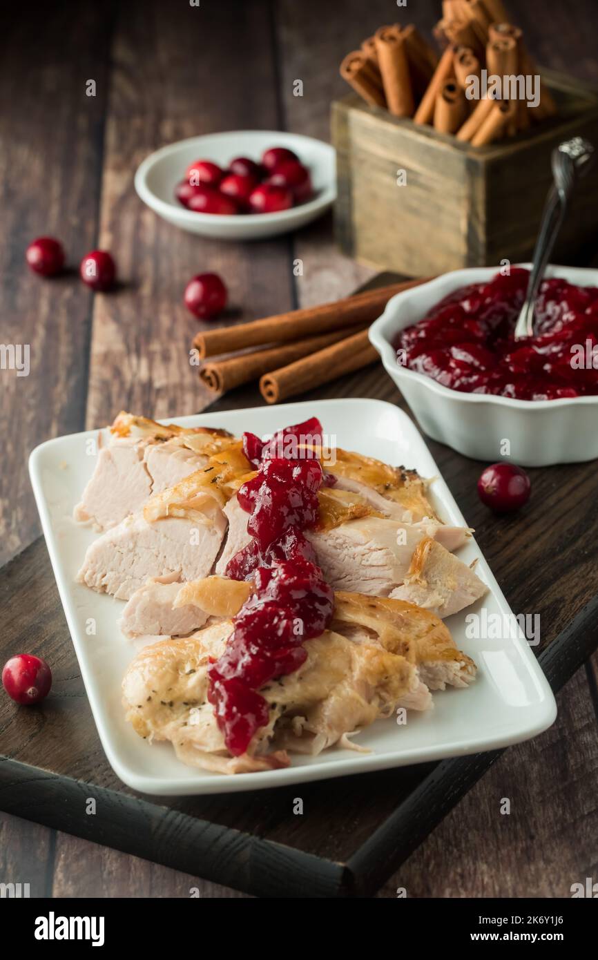 Roasted turkey slices covered with homemade cranberry sauce Stock Photo ...