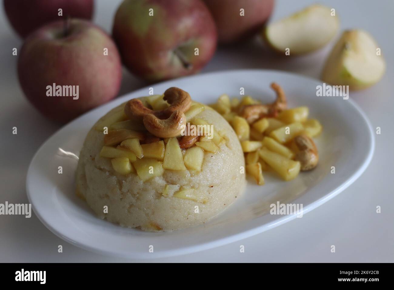 Apple Sheera. Indian pudding made of semolina flour, ghee, milk, dates ...