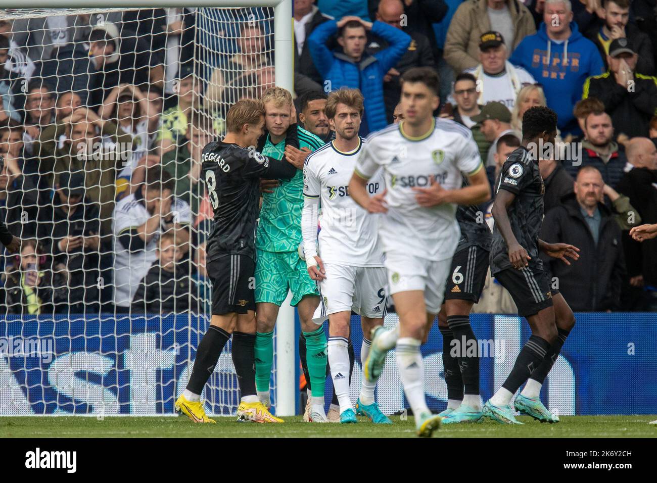 Aaron Ramsdale #1 of Arsenal celebrates with Martin Ødegaard #8 of ...