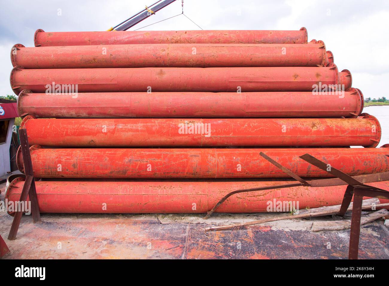 Rusted iron steel metal pipes stack an industrial field Stock Photo - Alamy