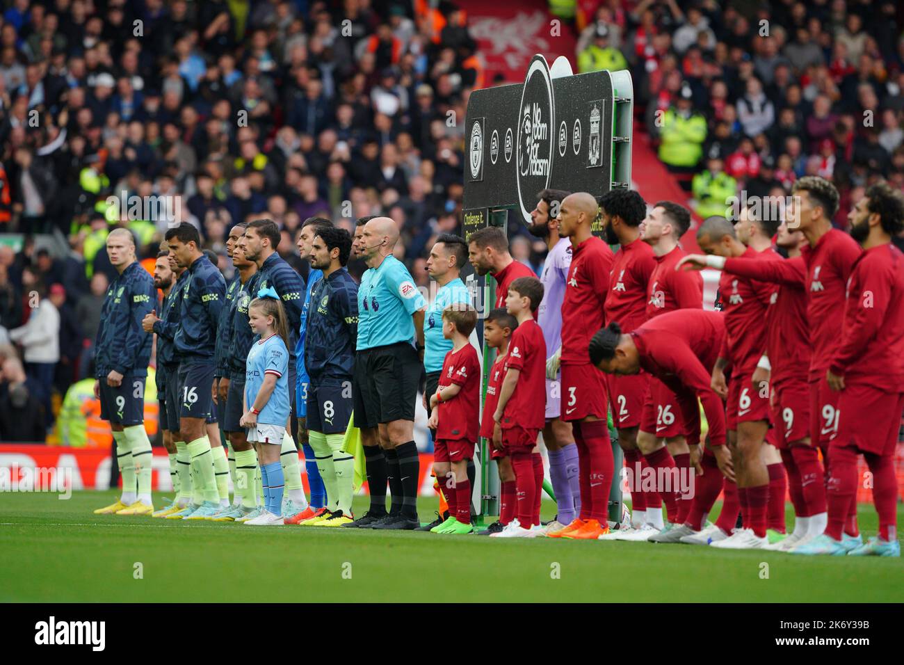 The teams line up ahead of the Premier League match at Anfield ...