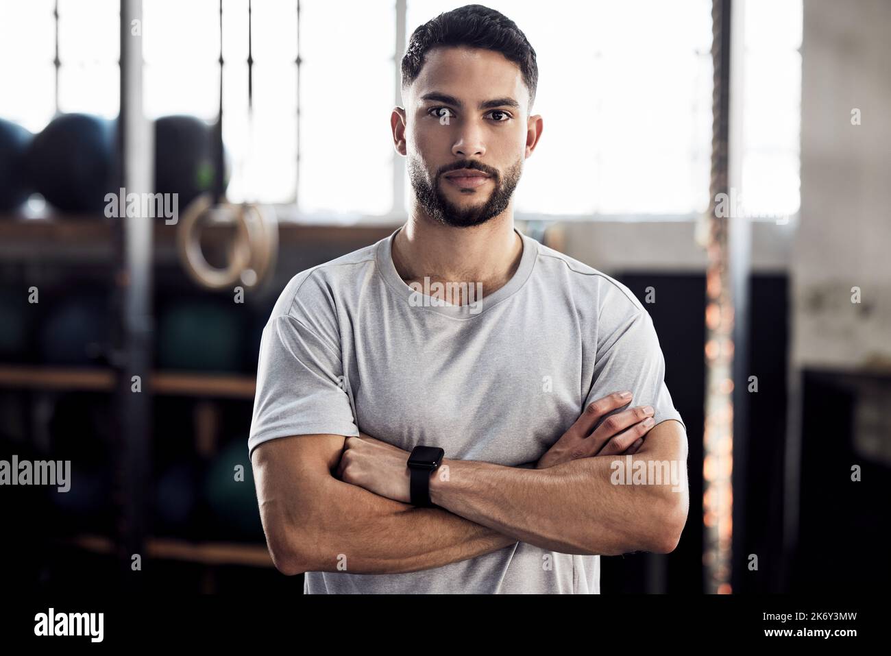 Young man standing in gym hi-res stock photography and images - Alamy
