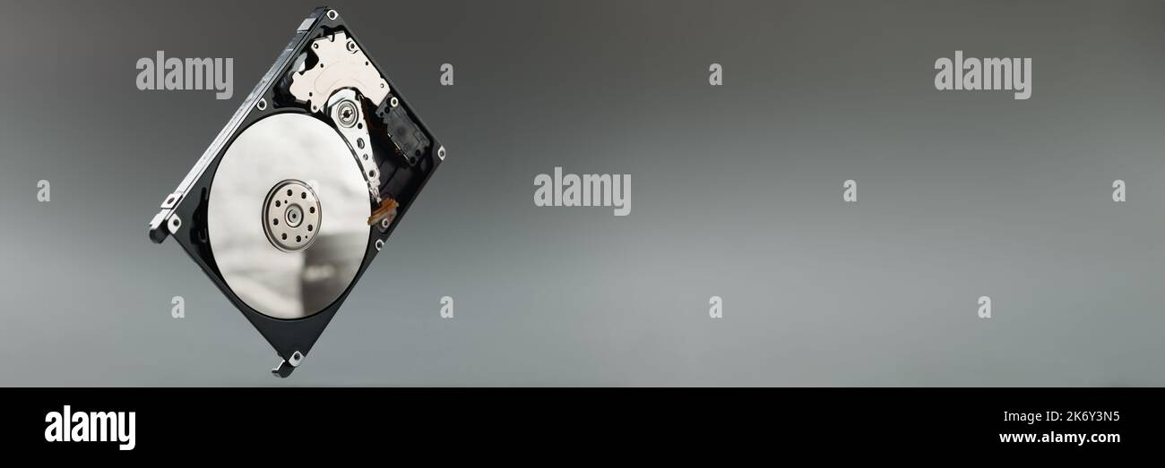 New hard drive pc a gray background, close-up Stock Photo - Alamy