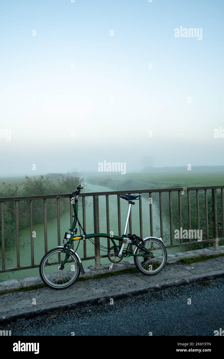 October 22 - Racing green folding Brompton bike in rural somerset ...