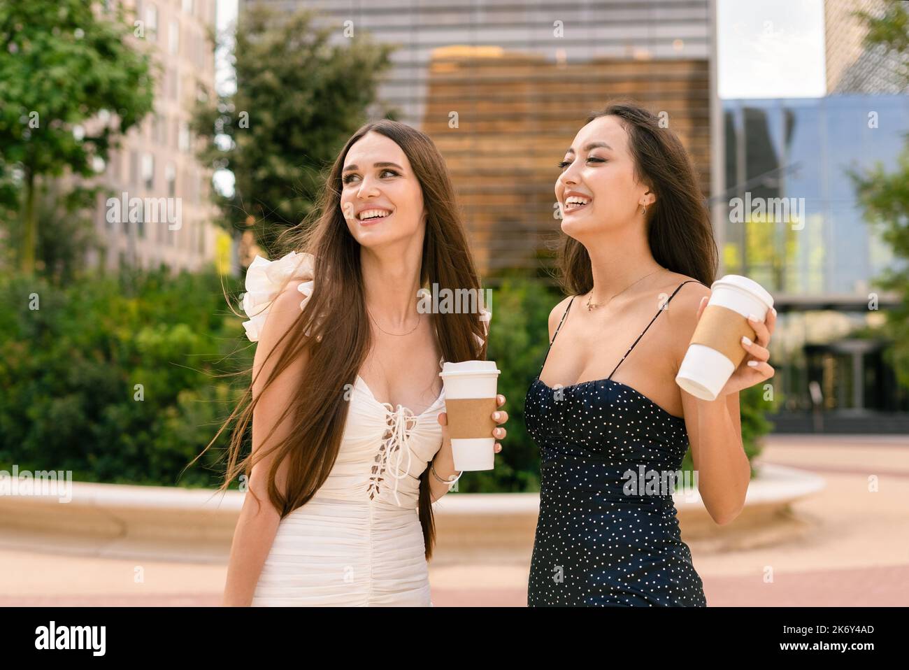 Happy women coffee go hi-res stock photography and images - Alamy