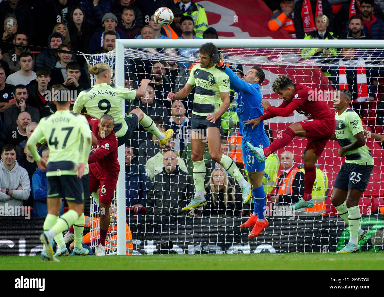 Manchester City goalkeeper Ederson punches the ball away during the ...