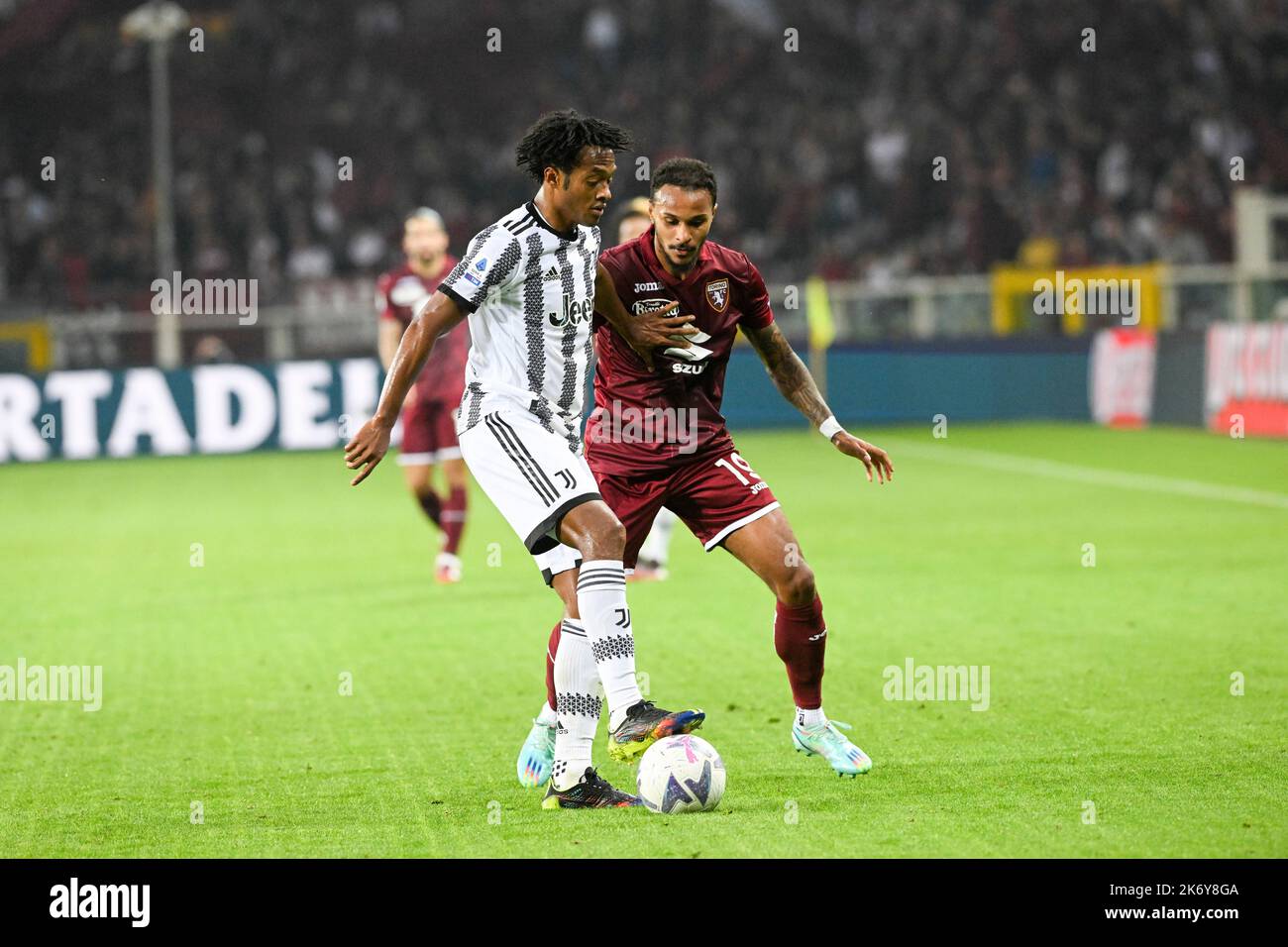 Juan Cuadrado of Juventus FC,Valentino Lazaro of Torino FC,during the ...