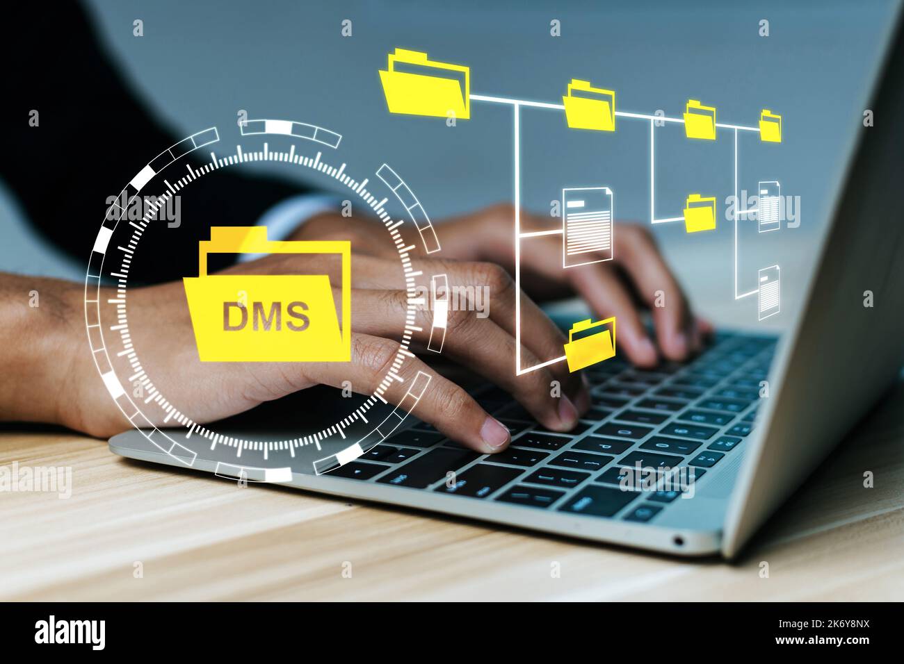 DMS. businessman hand working on mobile laptop computer with virtual ...