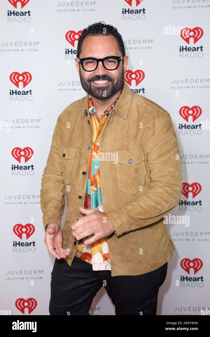 MIAMI, FLORIDA - Enrique Santos is seen on the red carpet at FTX Arena during iHeart Radio ...