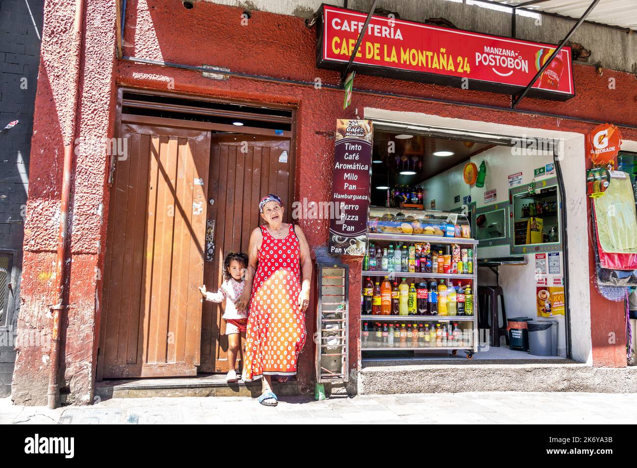 Child in doorway colombia hi-res stock photography and images - Alamy