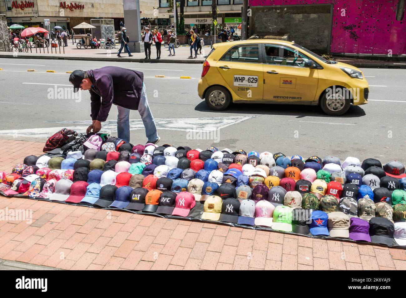 Santa fe sidewalk display sports teams caps hi-res stock photography ...