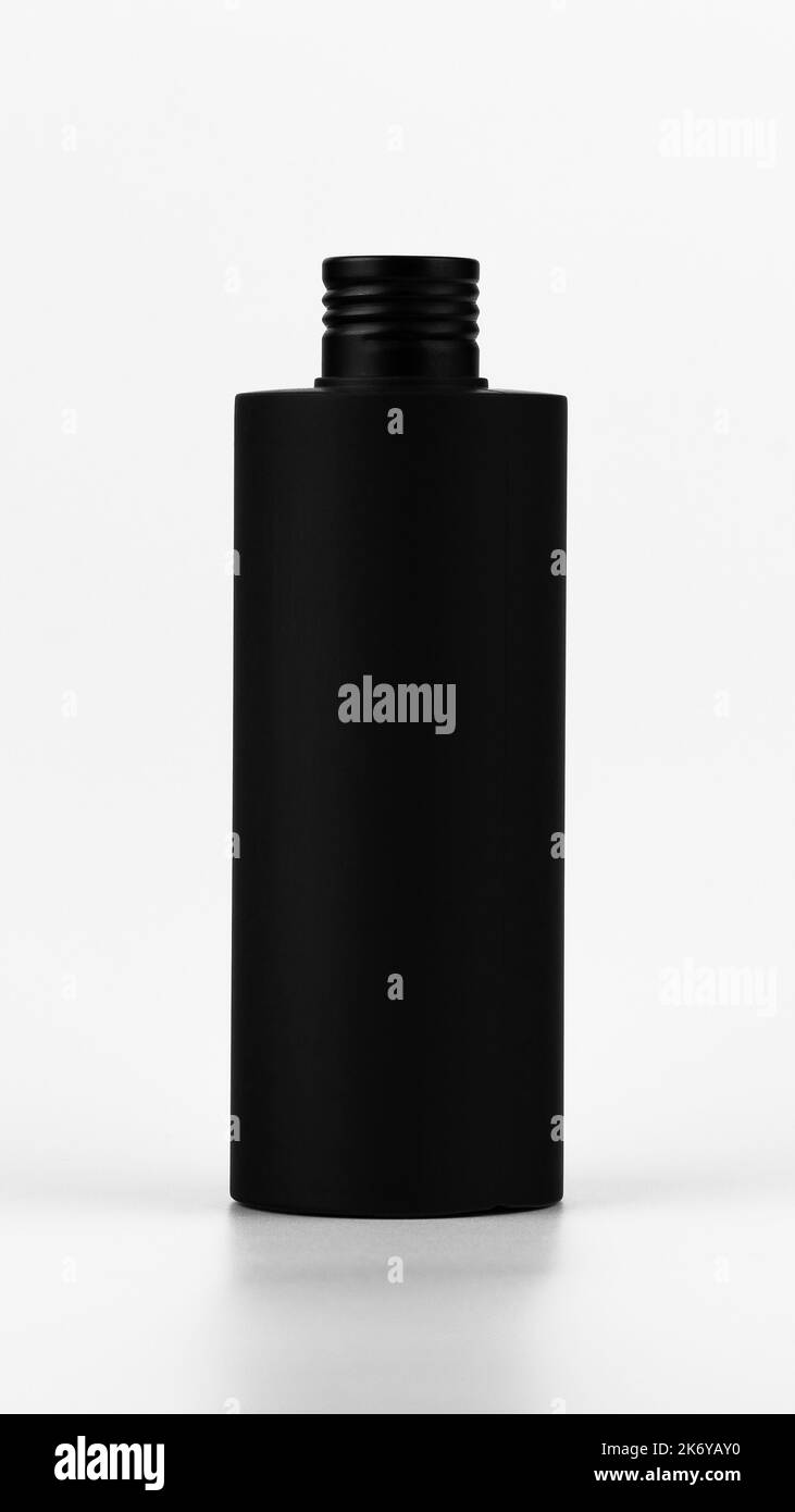 Unbranded black plastic flacon for cosmetics products vertical mockup ...