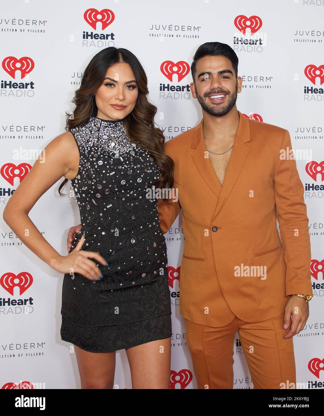 MIAMI, FLORIDA - Carlos Adyan and Andrea Mesa are seen on the red ...