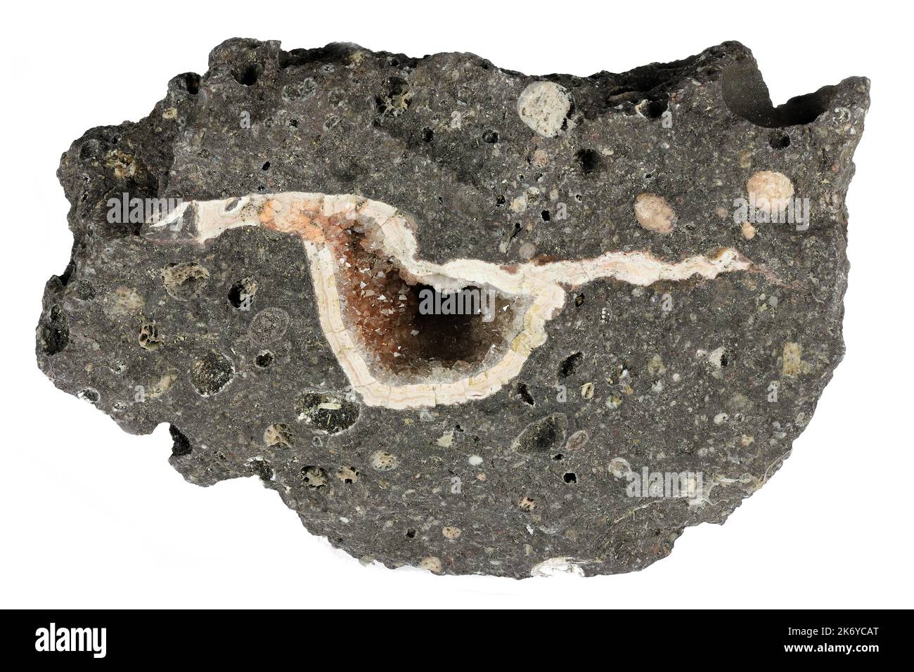 vug in porphyry from Fischbach, Germany isolated on white background ...