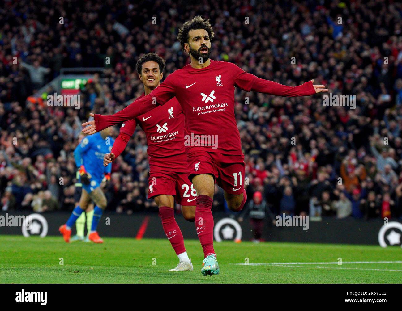 Liverpool's Mohamed Salah celebrates scoring the opening goal during ...