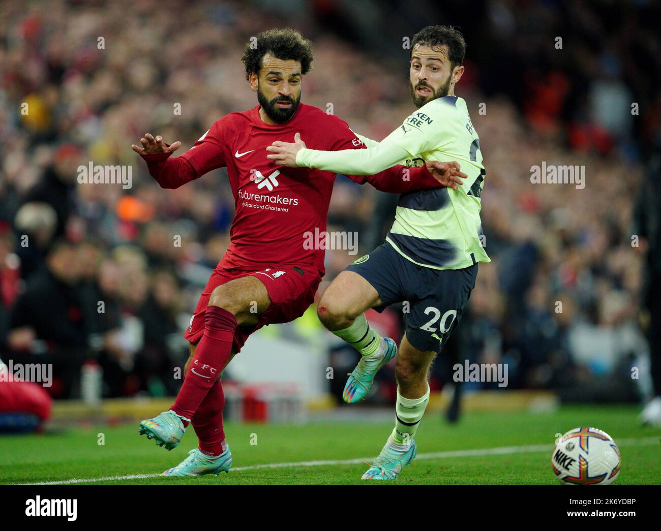 Liverpool's Mohamed Salah battles with Manchester City's Bernardo Silva ...