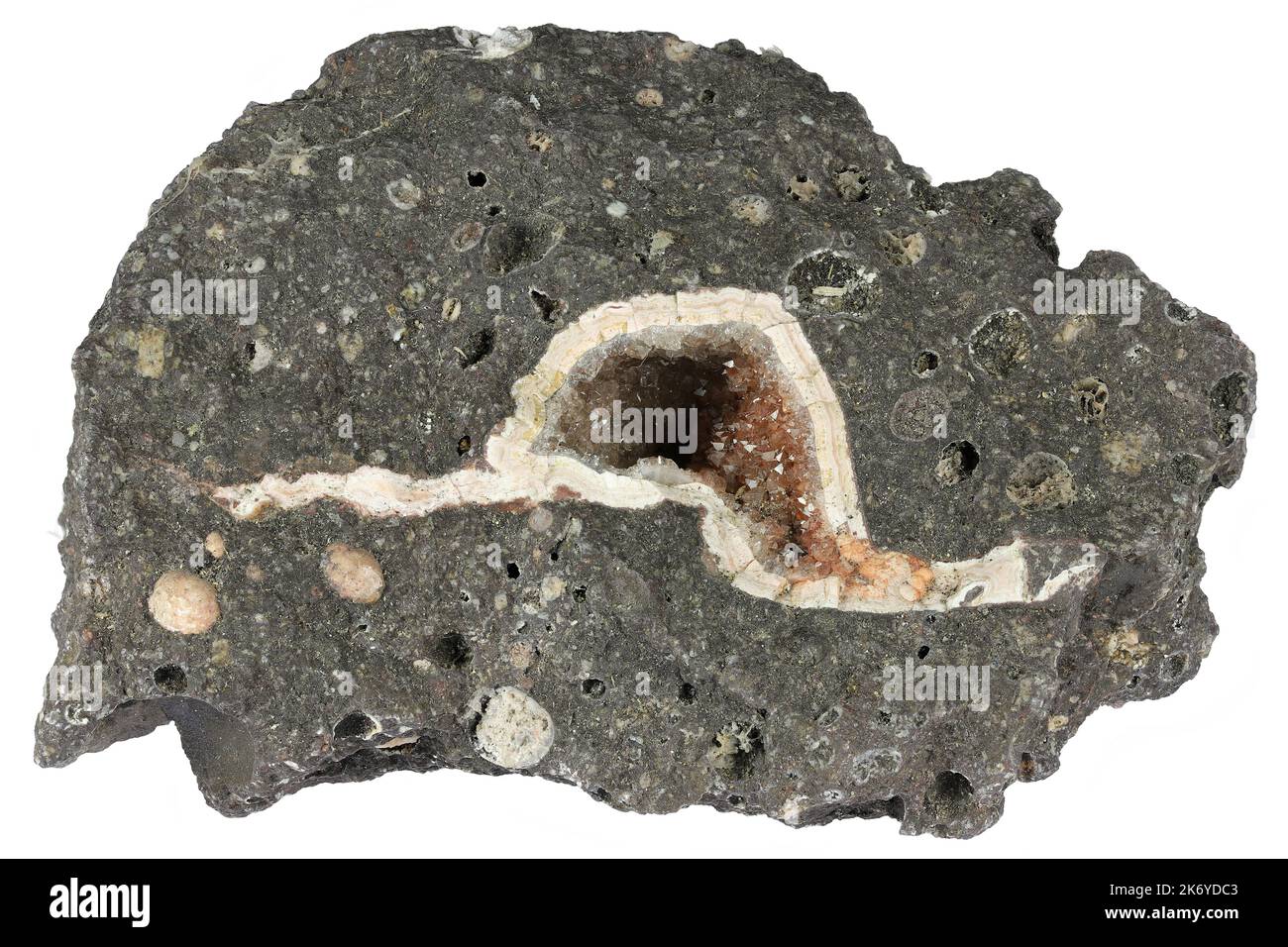 vug in porphyry from Fischbach, Germany isolated on white background ...