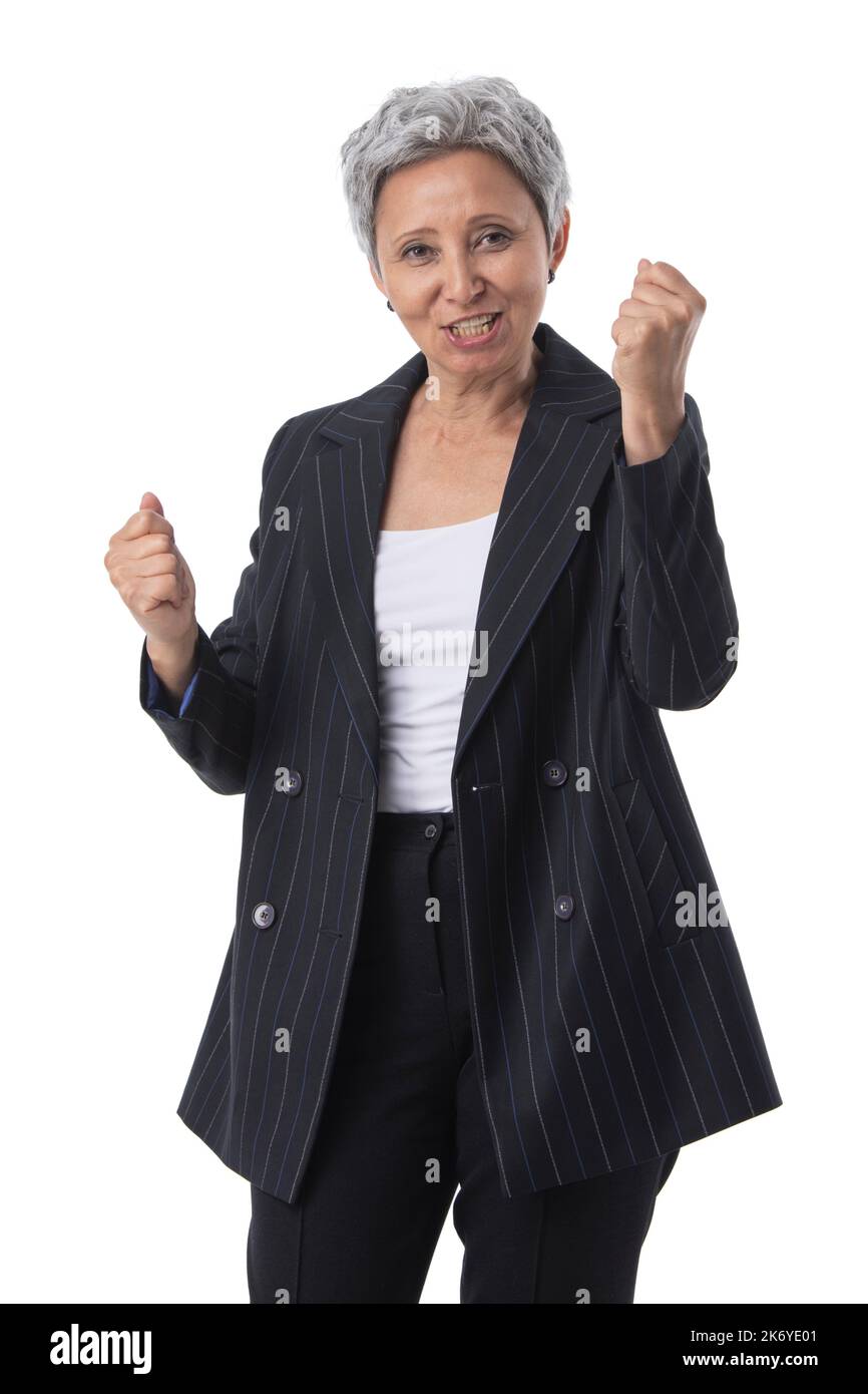 Mature asian business woman winner with raised arms isolated on white ...