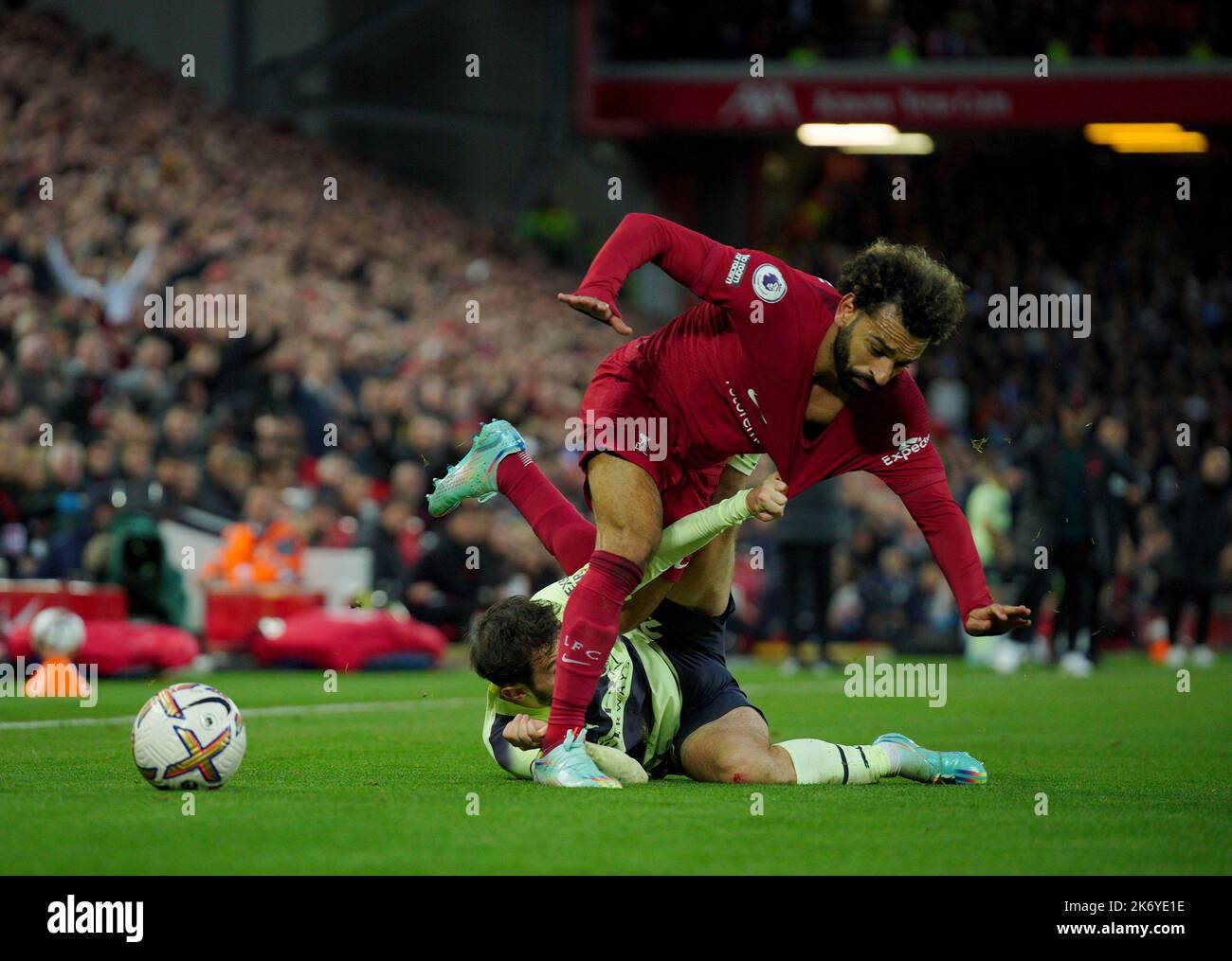 Liverpool's Mohamed Salah is fouled by Manchester City's Bernardo Silva ...