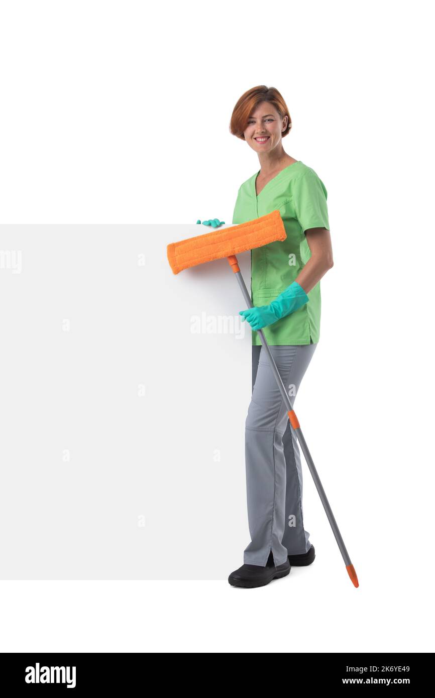 Cleaner woman with mop and blank banner isolated on white background ...