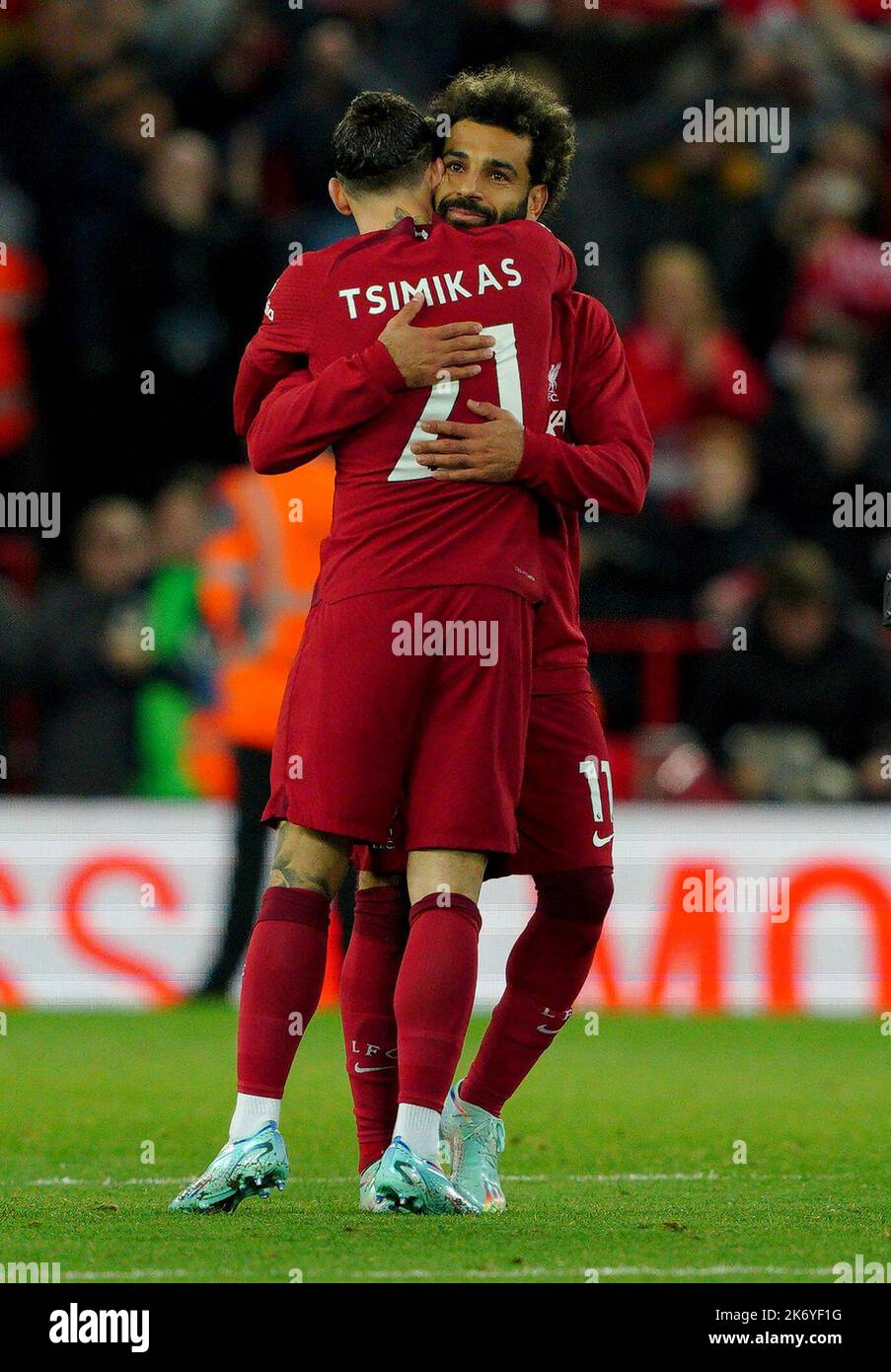 Liverpool's Mohamed Salah and Liverpool's Kostas Tsimikas at full time ...