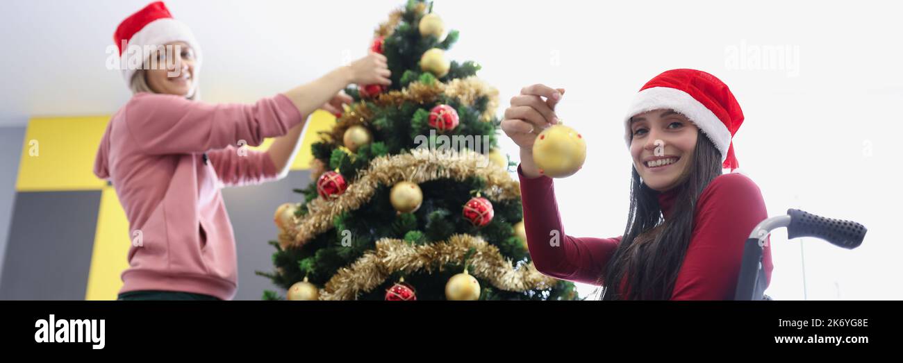 Big green christmas tree with toys Stock Photo - Alamy