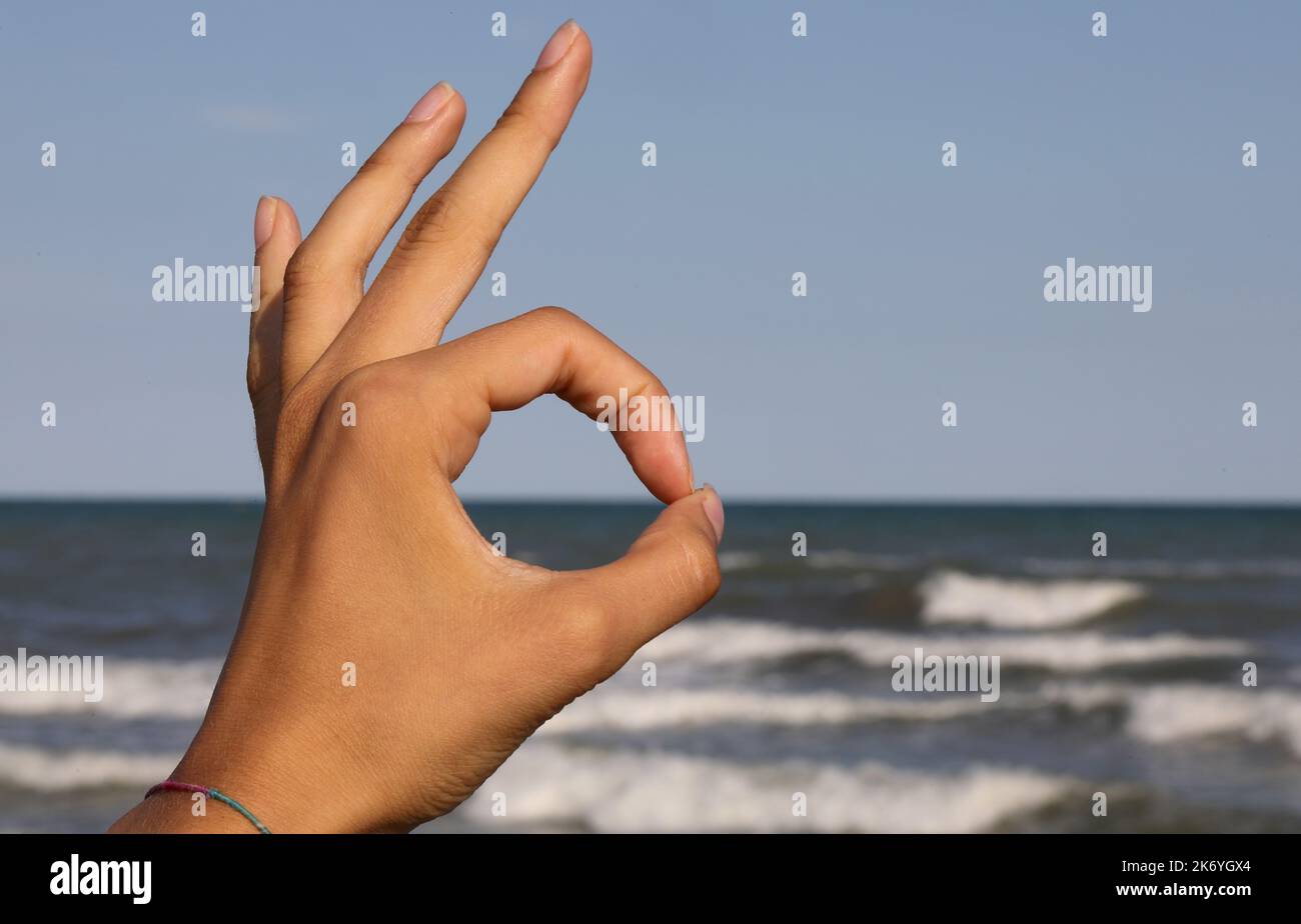 hand with thumb and forefinger united symbol of Ok Stock Photo - Alamy