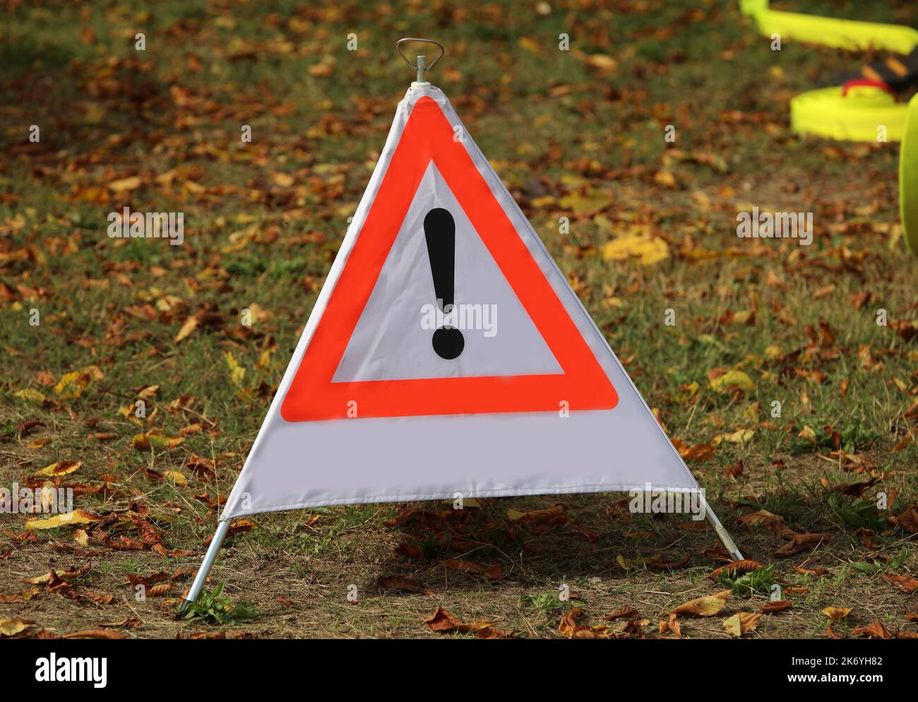 big triangle with large exclamation mark Stock Photo - Alamy
