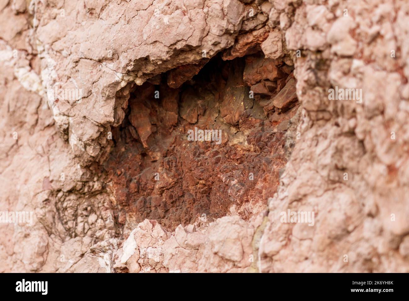A hole in the wall from artillery fire during the war. Damage to a ...