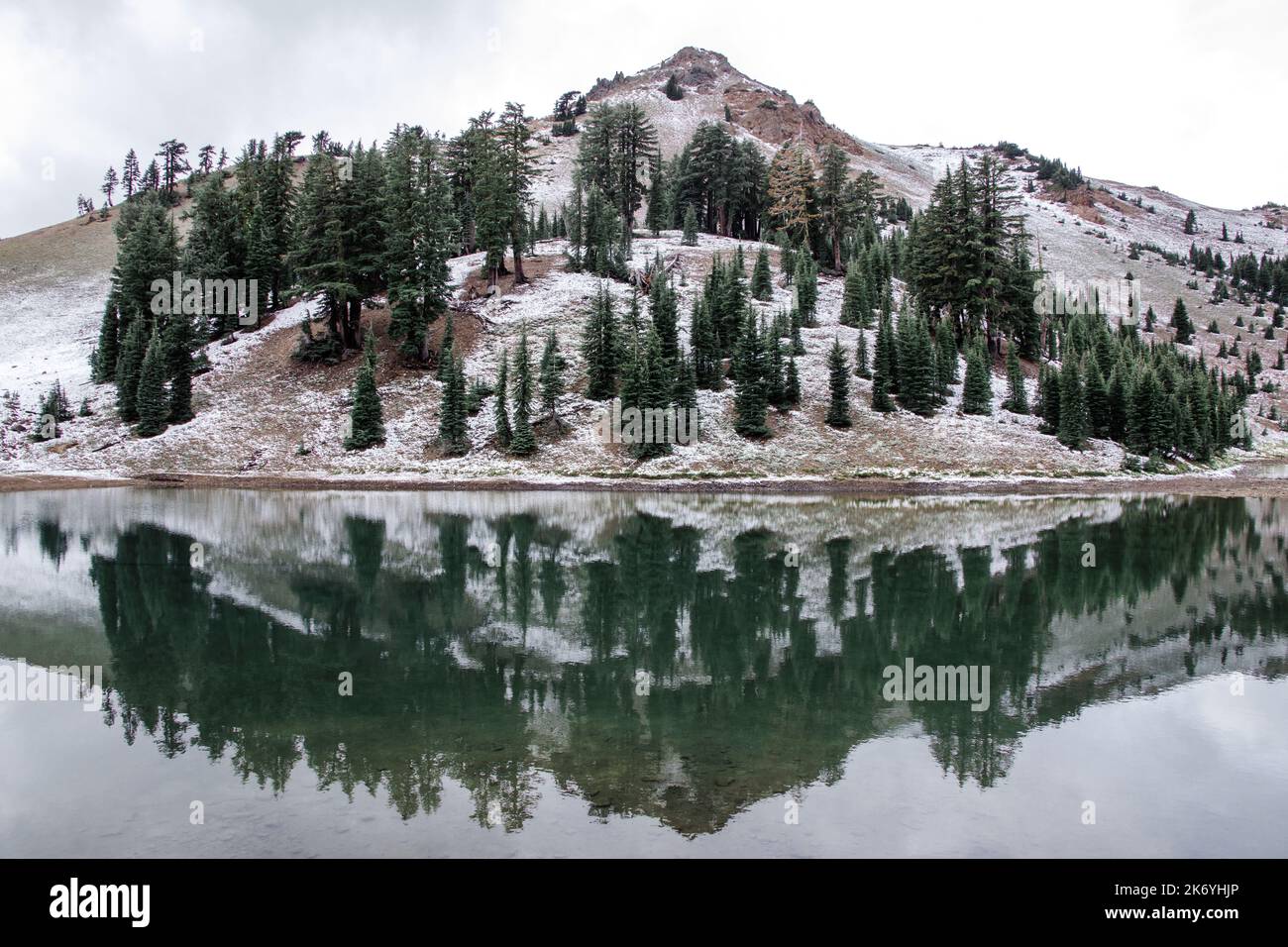 Volcanic lake in the snowy mountains. Ridge lakes in Lassen Volcanic ...