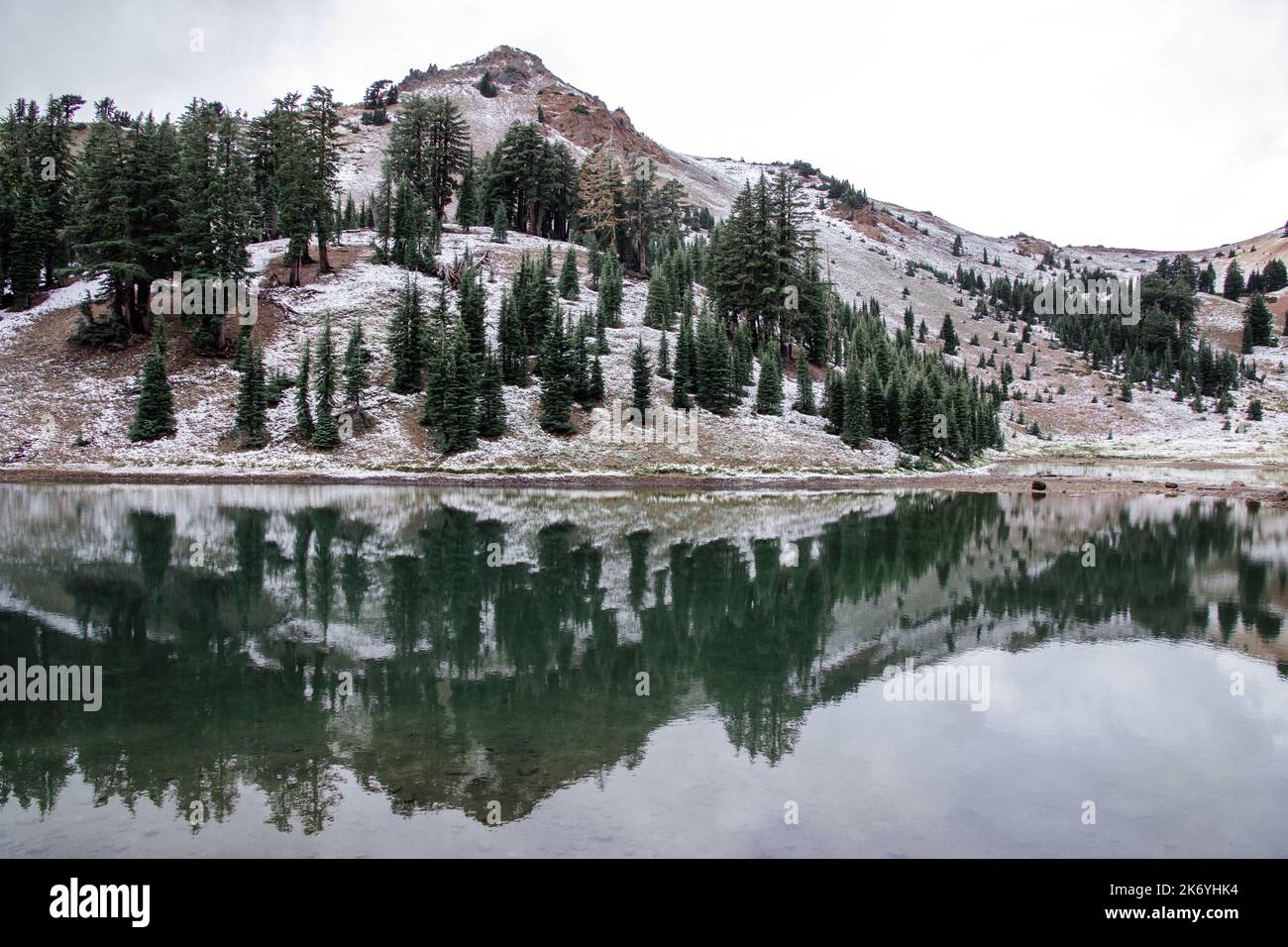 Volcanic lake in the snowy mountains. Ridge lakes in Lassen Volcanic ...