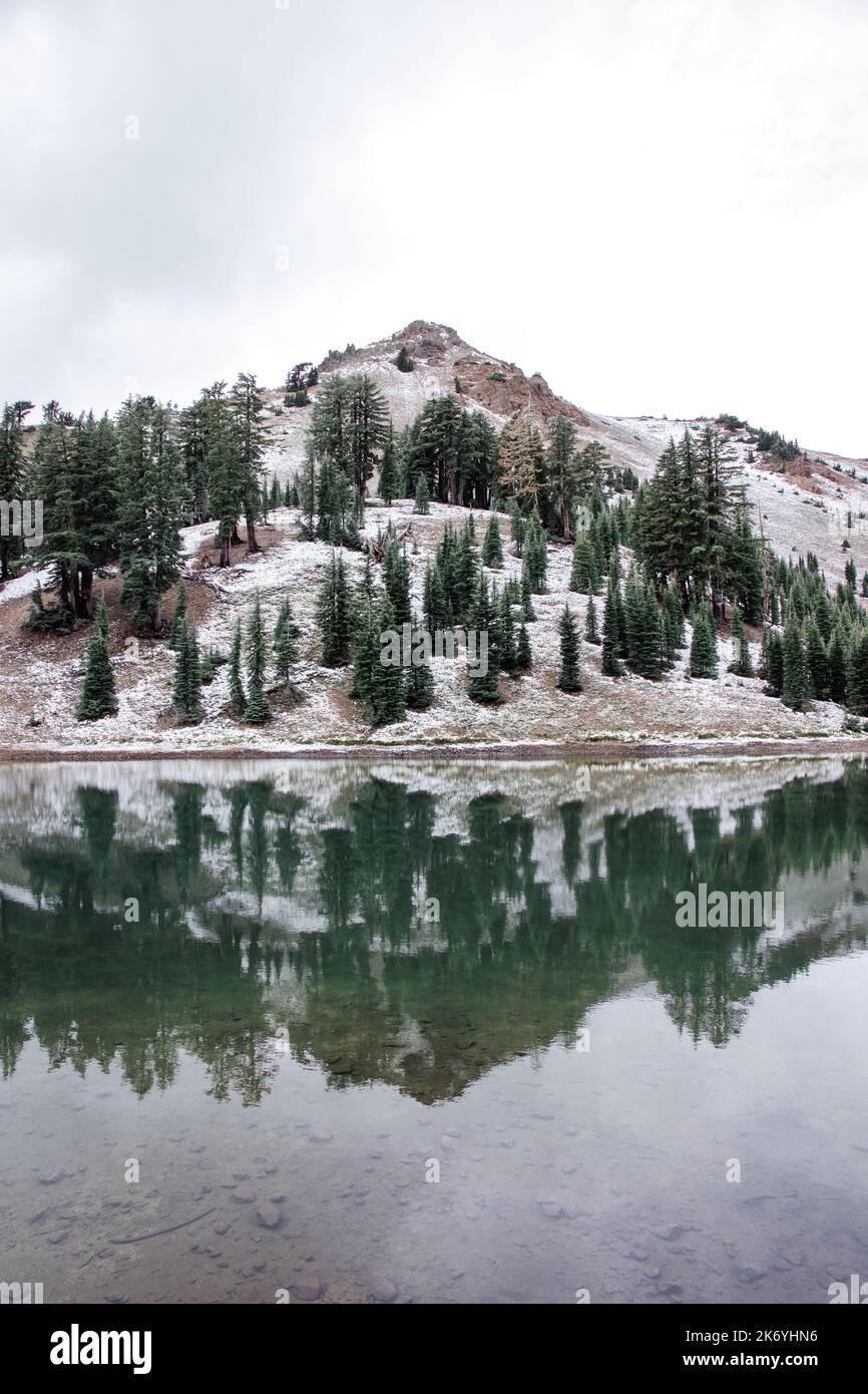Volcanic lake in the snowy mountains. Ridge lakes in Lassen Volcanic ...