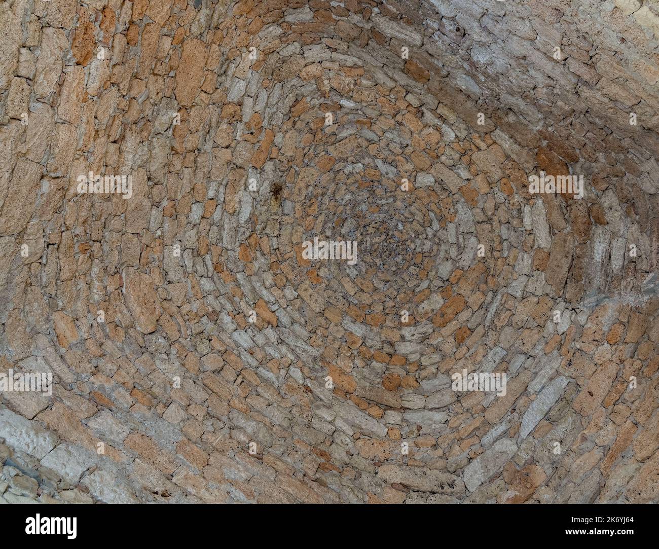 circular hand-made stone roof inside a medieval church in the Spanish ...