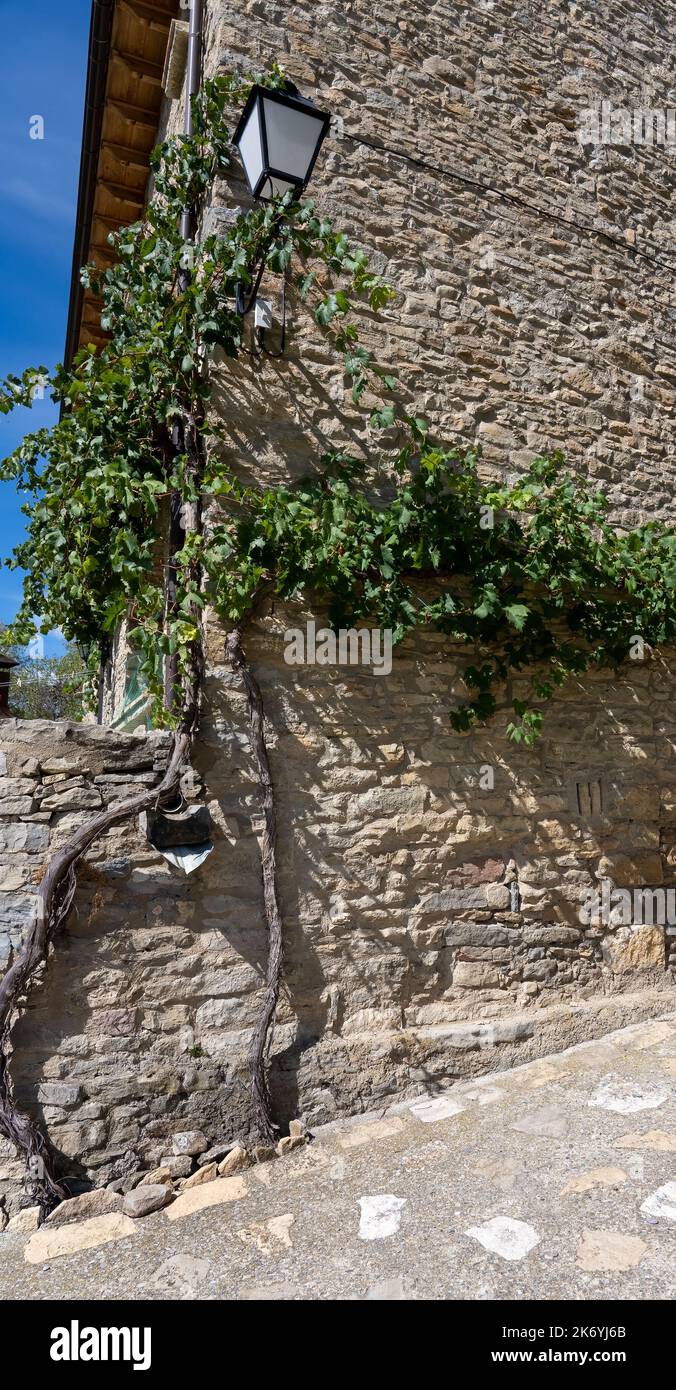 stone built walls and buildings of a typical Spanish Pyrenees village ...