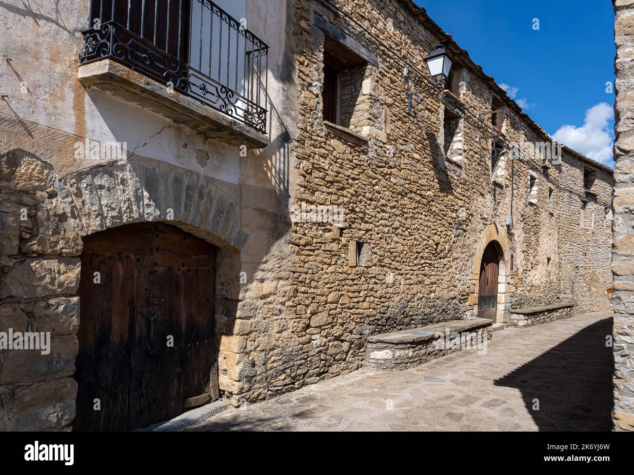 stone built walls and buildings of a typical Spanish Pyrenees village ...