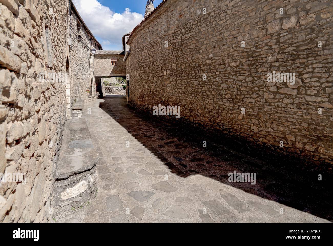 stone built walls and buildings of a typical Spanish Pyrenees village ...