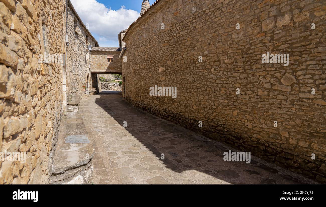 stone built walls and buildings of a typical Spanish Pyrenees village ...