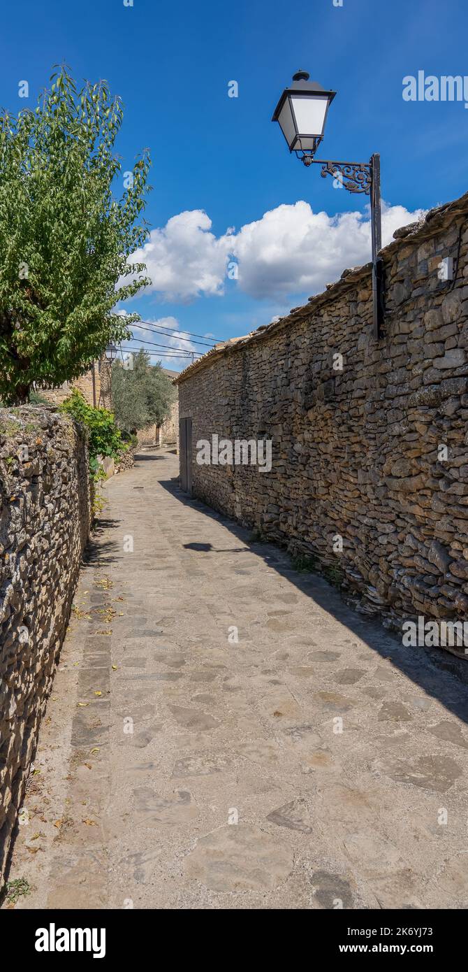 stone built walls and buildings of a typical Spanish Pyrenees village ...