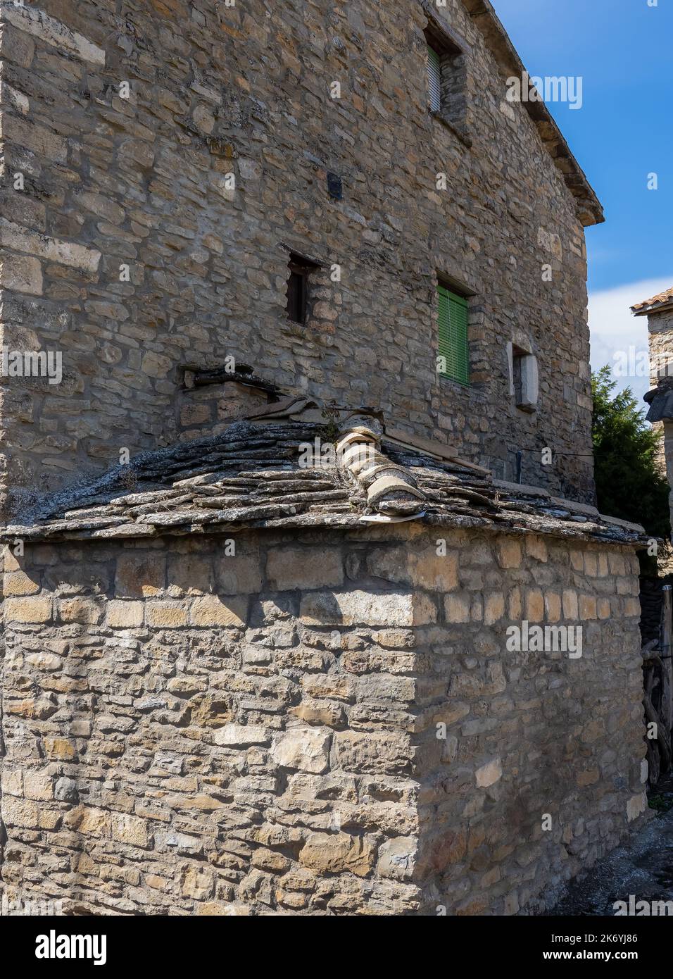 stone built walls and buildings of a typical Spanish Pyrenees village ...
