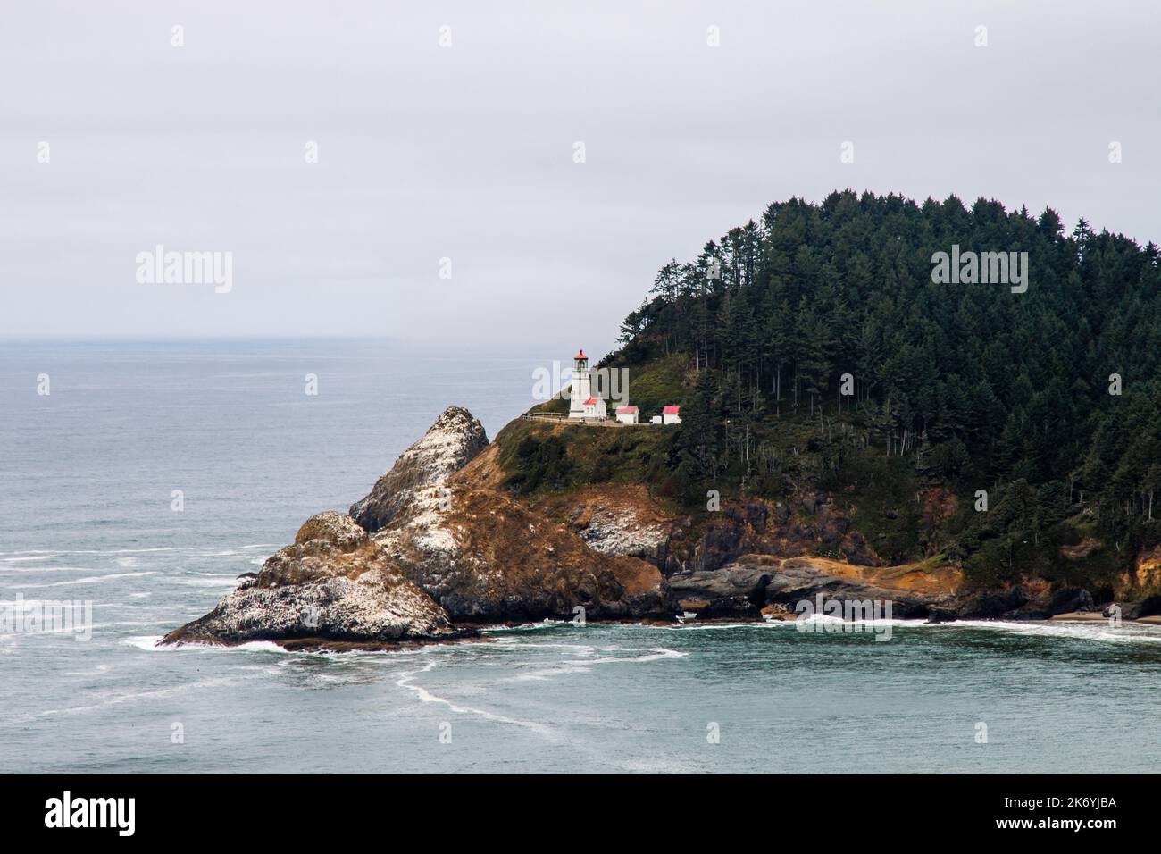 Scenic view of Heceta Head Lighthouse on the coastline of Oregon by ...