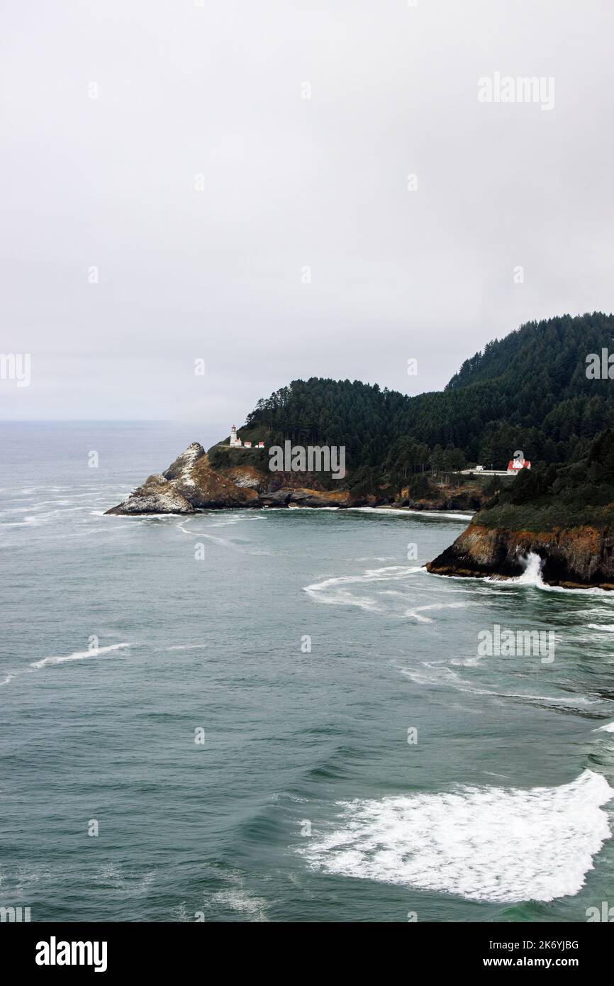 Scenic view of Heceta Head Lighthouse on the coastline of Oregon by ...