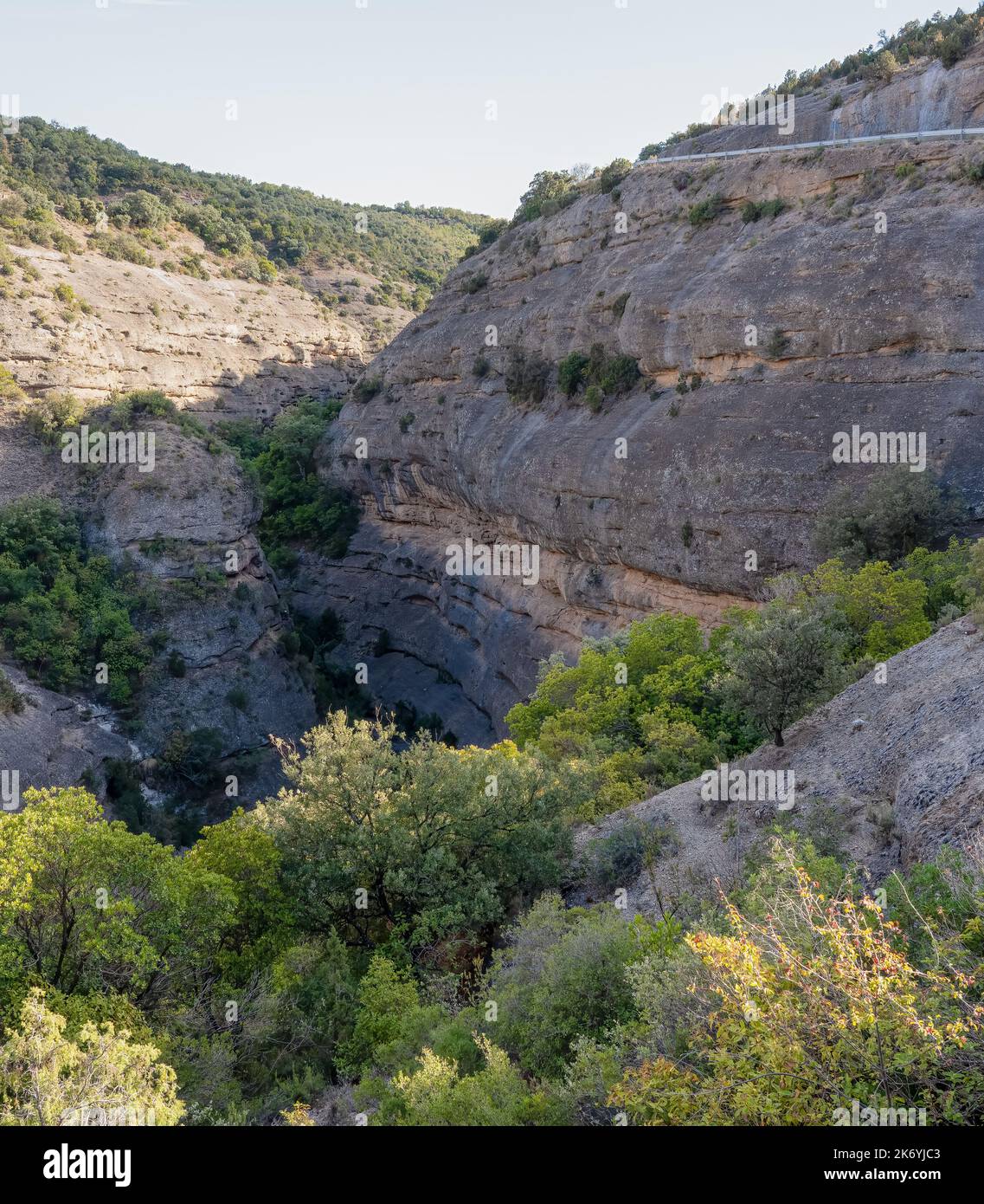 a mountain road winding around a rocky gorge, Spanish pyrenees Stock ...