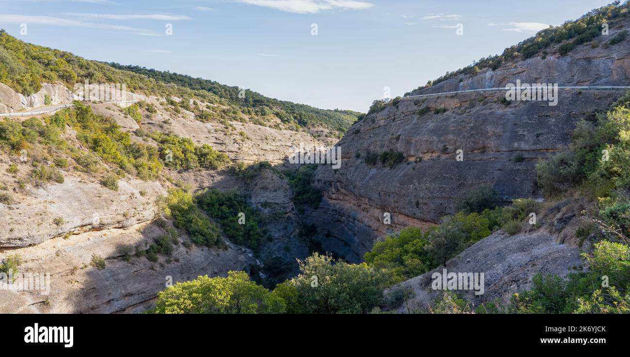 a mountain road winding around a rocky gorge, Spanish pyrenees Stock ...