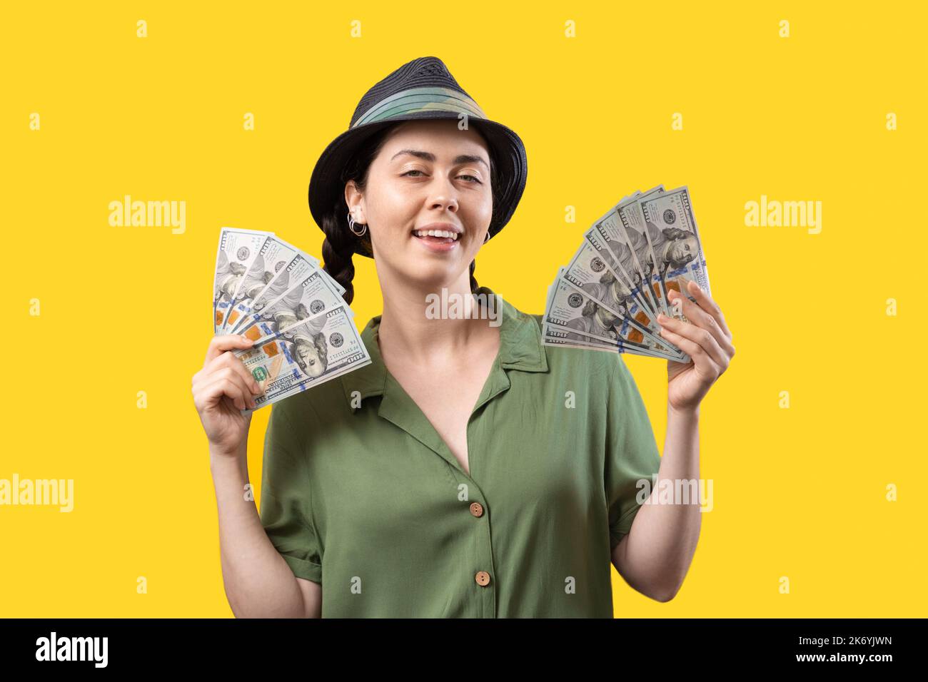 Wealth and investment. Portrait of a happy Caucasian woman wearing ...