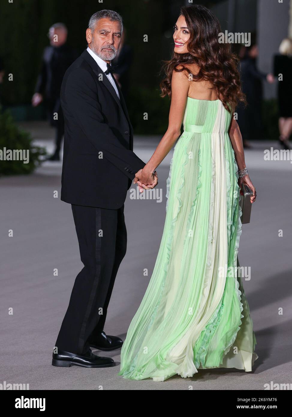 LOS ANGELES, CALIFORNIA, USA - OCTOBER 15: George Clooney and wife Amal ...