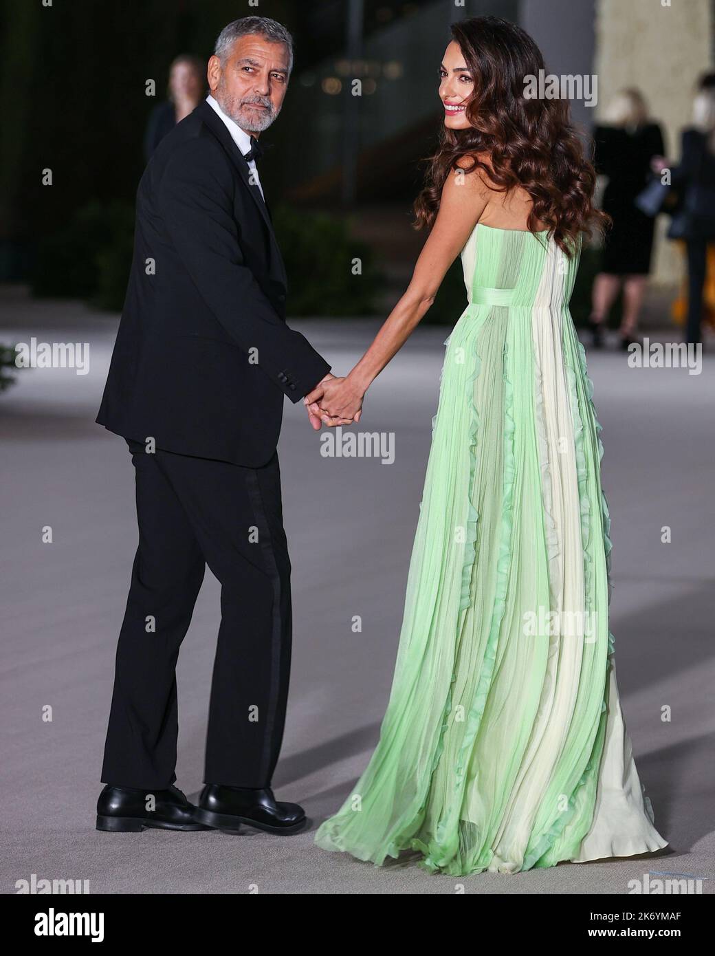 LOS ANGELES, CALIFORNIA, USA - OCTOBER 15: George Clooney and wife Amal ...